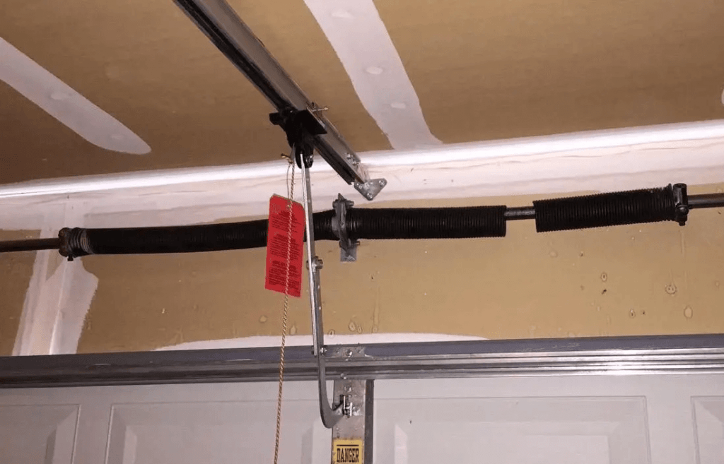 HOW TO OPEN GARAGE DOOR WITH BROKEN SPRING - GARAGE GUIDES
